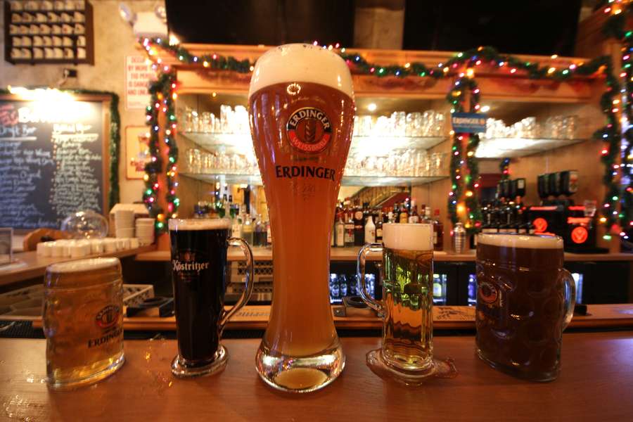 3-liter steins in a German beer mansion Downtown - Thrillist NY