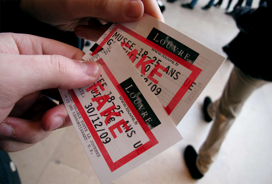 Travel Scams to Avoid While on Vacation - Fake tickets to the Louvre ...