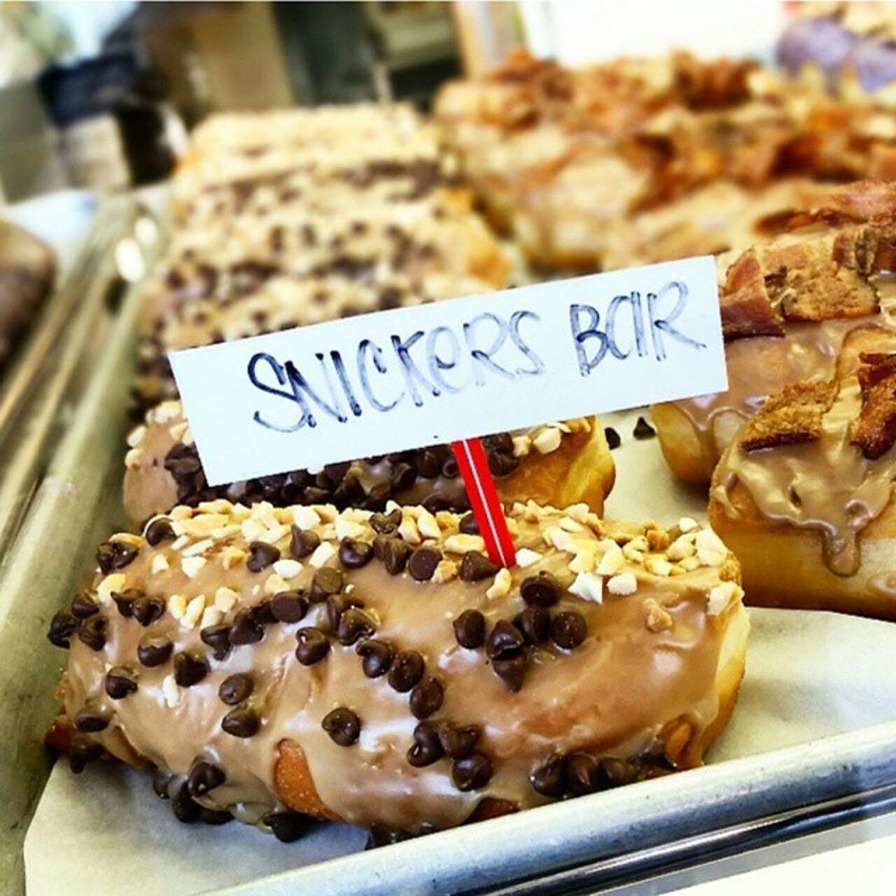 California Donuts Snickers Bar Donut - Thrillist