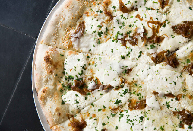 World's Cheesiest Pizza Has 99 Cheeses