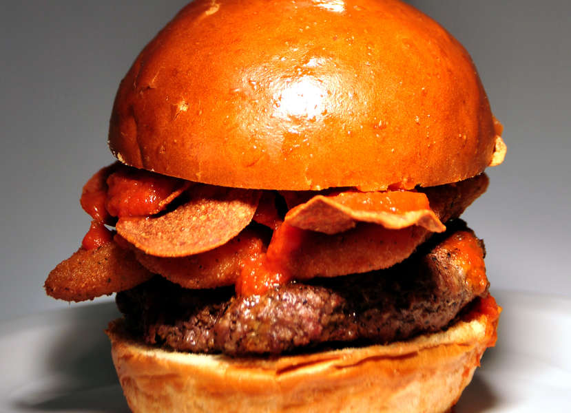 The Epic Pizza Burger Is Back At This SoCal Burger Chain - Thrillist