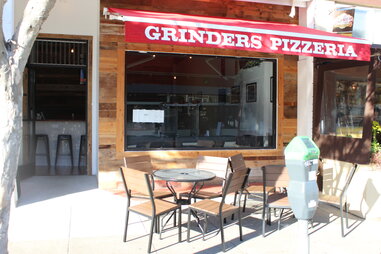 Bacon cheeseburger pizza at Grinders Pizzeria in San Francisco - Thrillist