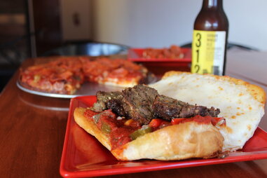 Bacon cheeseburger pizza at Grinders Pizzeria in San Francisco - Thrillist