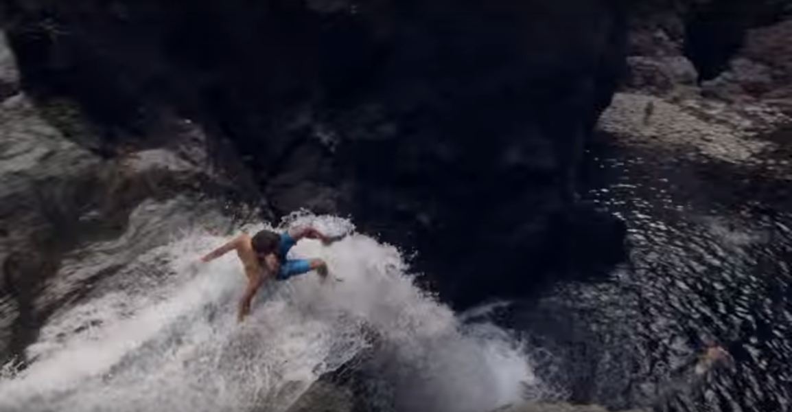 Watch Insane People Go Down a 35ft Natural Slip 'N Slide Waterfall ...
