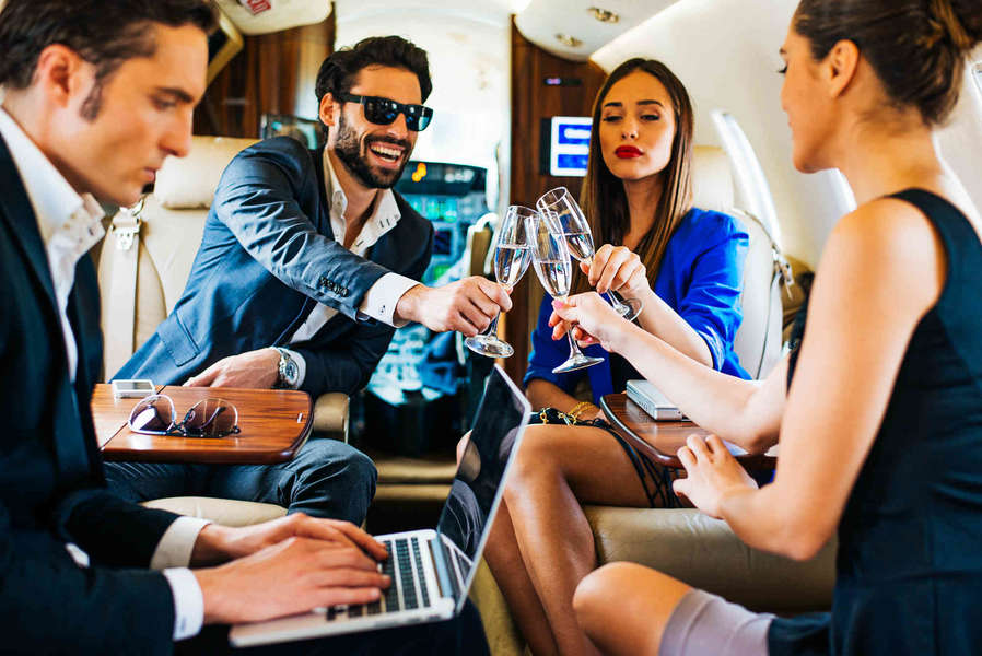 How to Make Coach Feel Like First Class - Air Travel Hacks - Thrillist