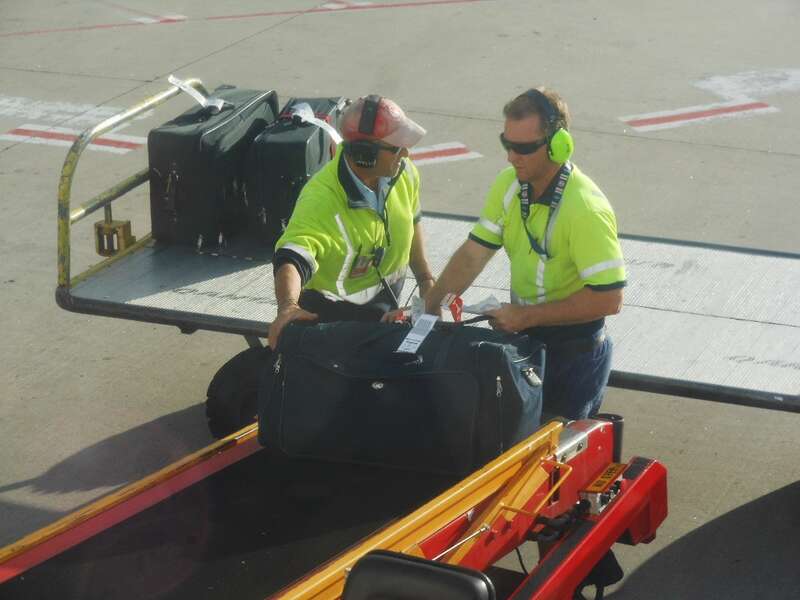Watch Airport Workers Play 'Bag Toss' With Luggage - Thrillist
