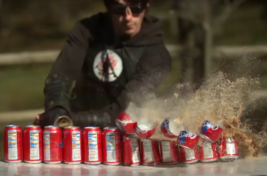 Slo-Mo Video Shows a Guy Slice Through 10 Cans of Soda with a Katana ...