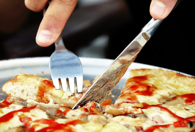 In Defense of Eating Pizza With a Fork