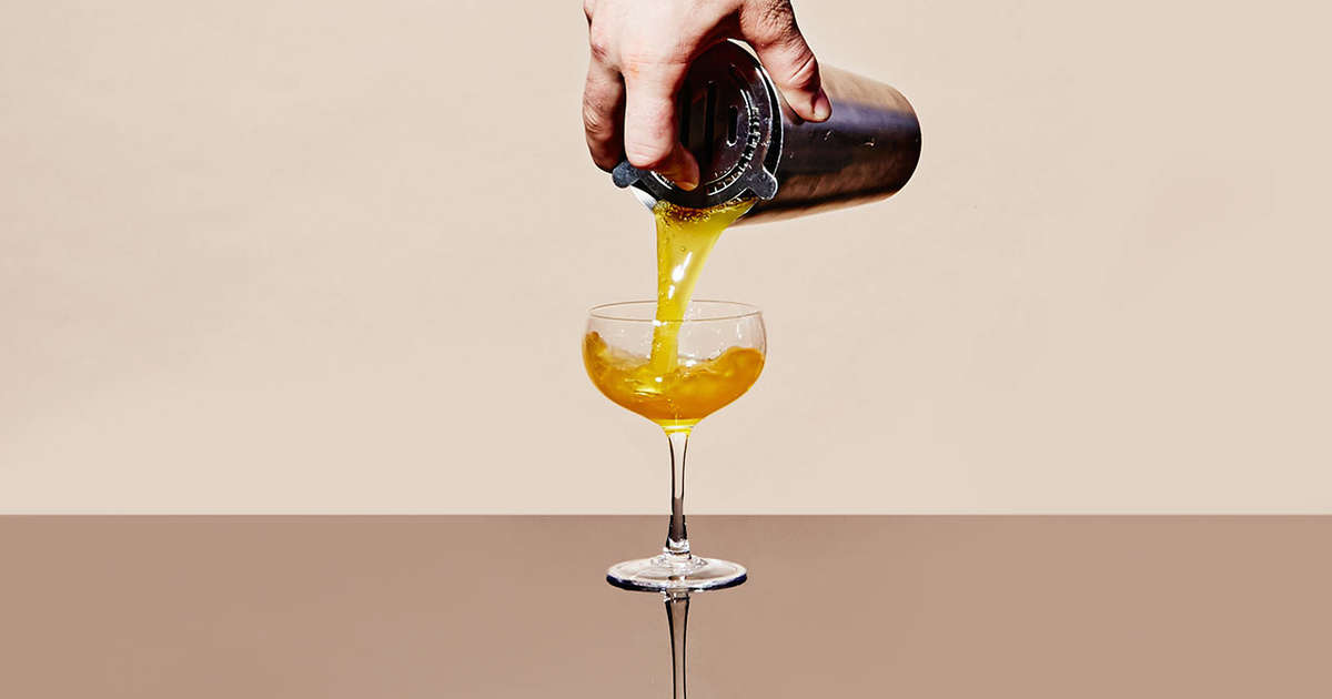 How to Strain a Cocktail with a Hawthorne Strainer - Thrillist