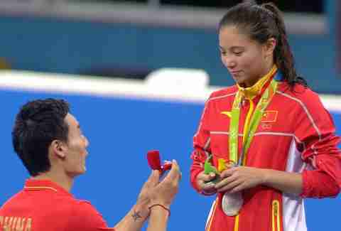 Why Do Olympians Bite Their Gold Medals? - Thrillist