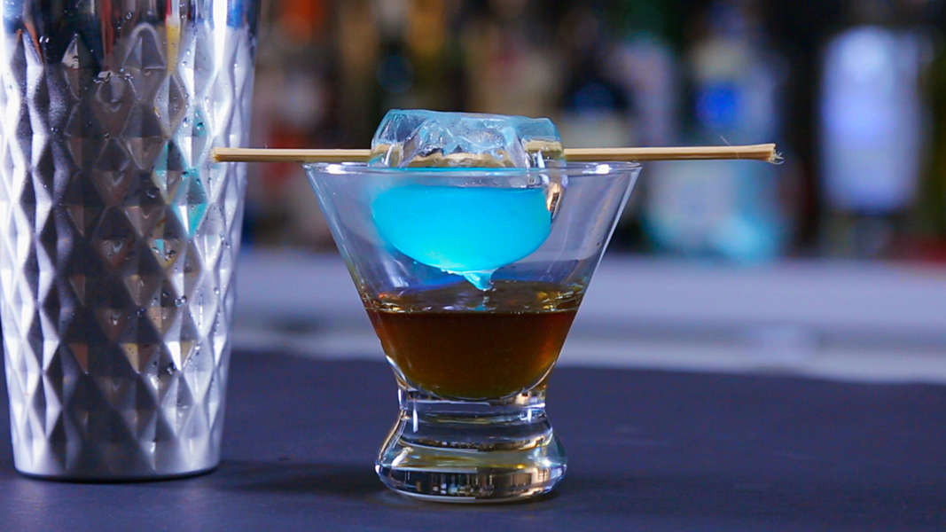 Magic Ice Ball Cocktail Recipe Video - Thrillist