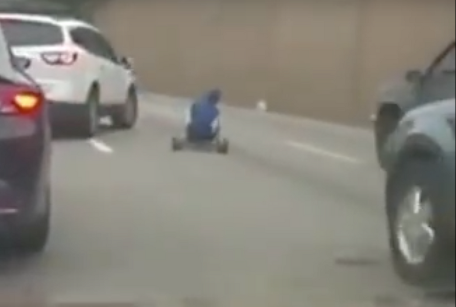 Man Drives Big Wheel on Freeway - Thrillist