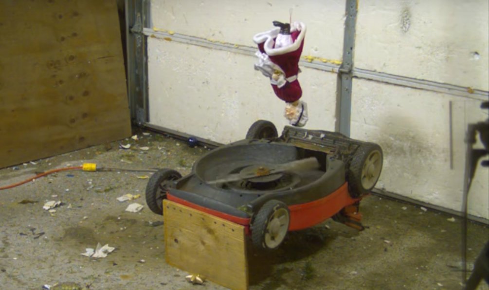 Watch Christmas Decorations Destroyed By a Lawn Mower - Thrillist