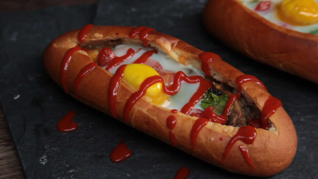 How to Make Sausage and Eggs Breakfast Bread Boats Recipe - Thrillist