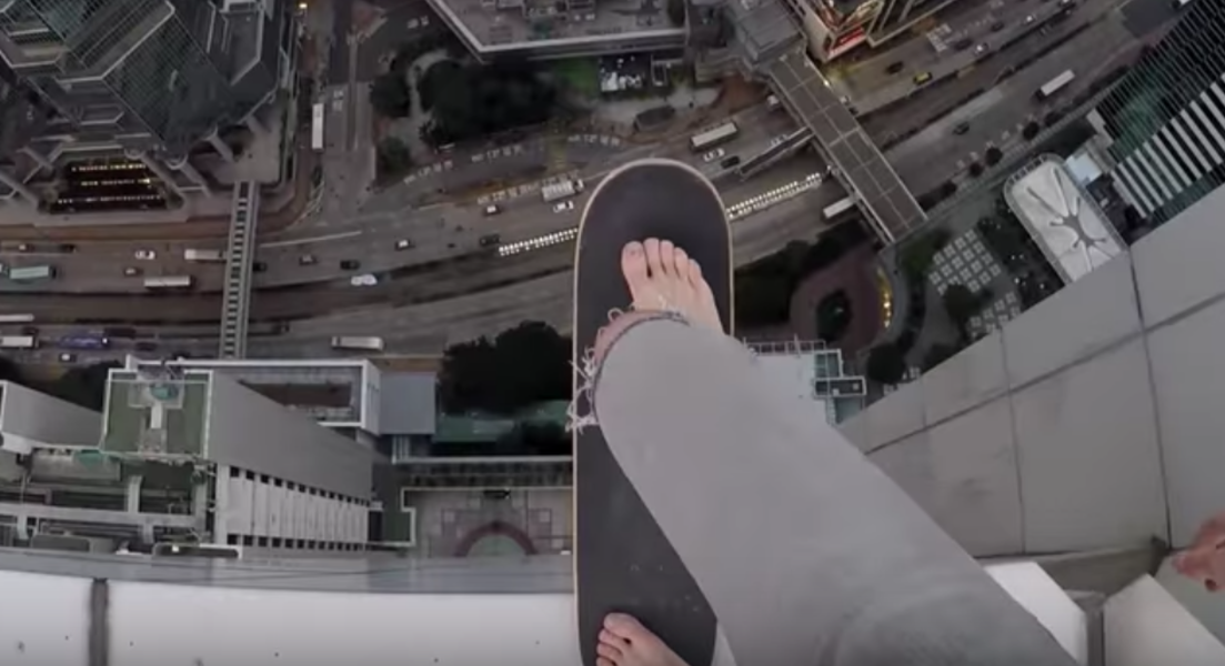 Oleg Cricket Skateboards on the Ledge of a Skyscraper in Hong Kong ...