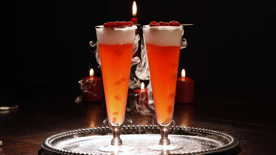 How to Make a Raspberry Cosmopolitan Drink Recipe - Thrillist