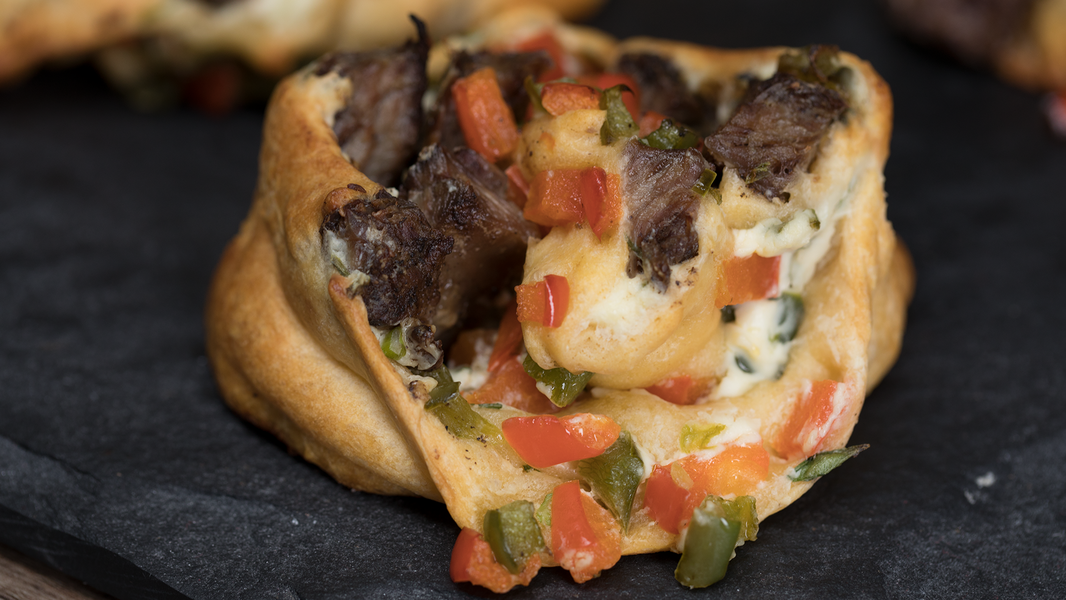 How to Make Philly Cheesesteak Crescent Pinwheels Recipe - Thrillist