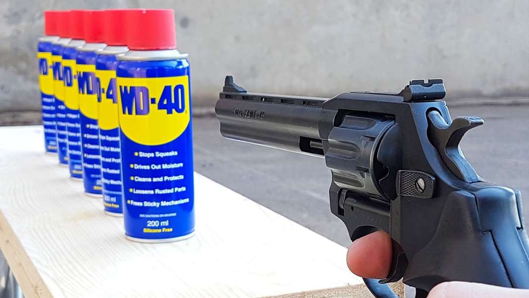 MrGear Shoots WD-40 Cans With a Gun - Thrillist