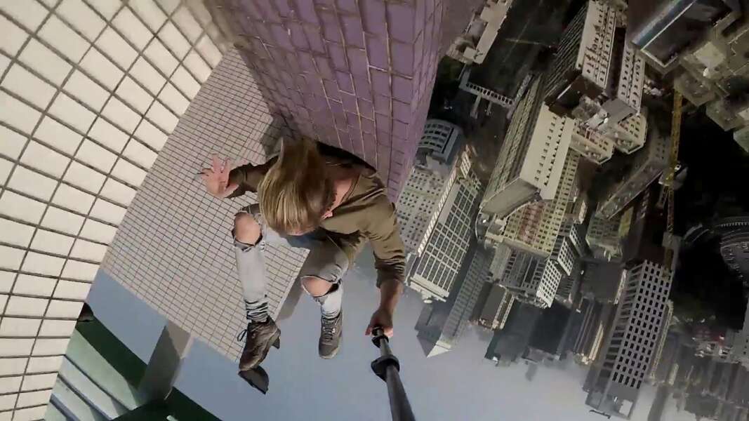 Oleg Cricket Does Terrifying Somersaults on a Skyscraper Ledge - Thrillist