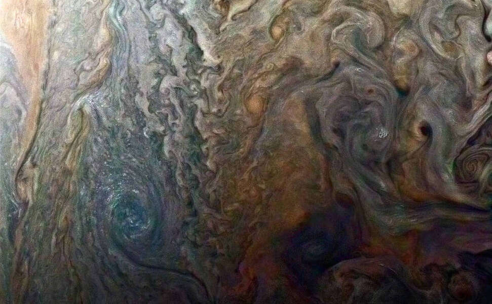 Enhanced Juno Image Shows Jupiter's Swirling Storms in Color - Thrillist