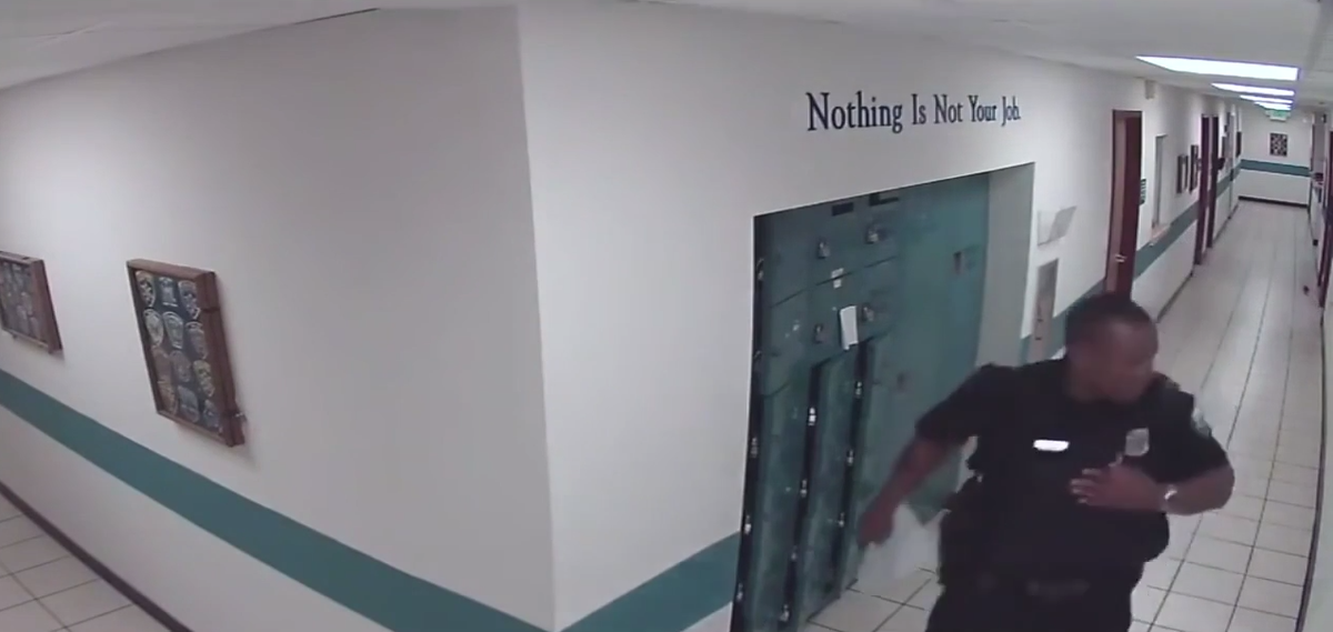 CCTV Footage Captures Cop Fleeing From Mouse - Thrillist