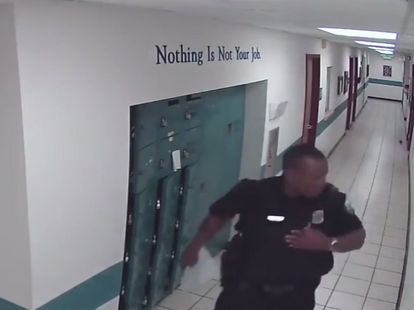 CCTV Footage Captures Cop Fleeing From Mouse - Thrillist