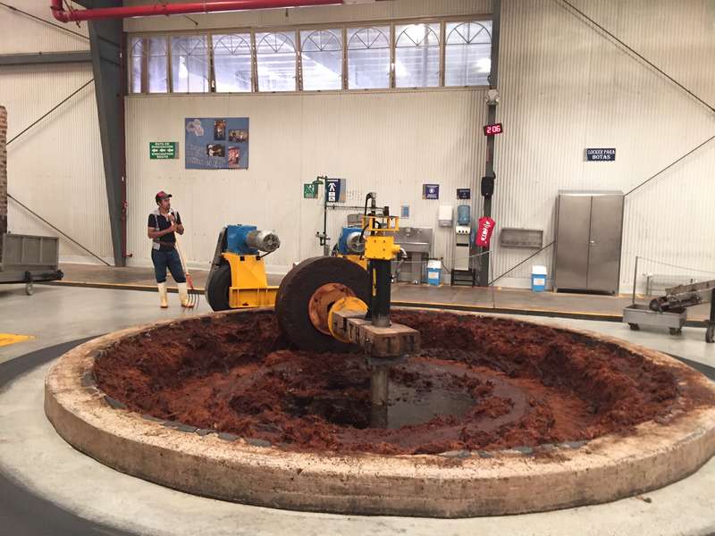 How Is Tequila Made? The Tahona Wheel - Thrillist