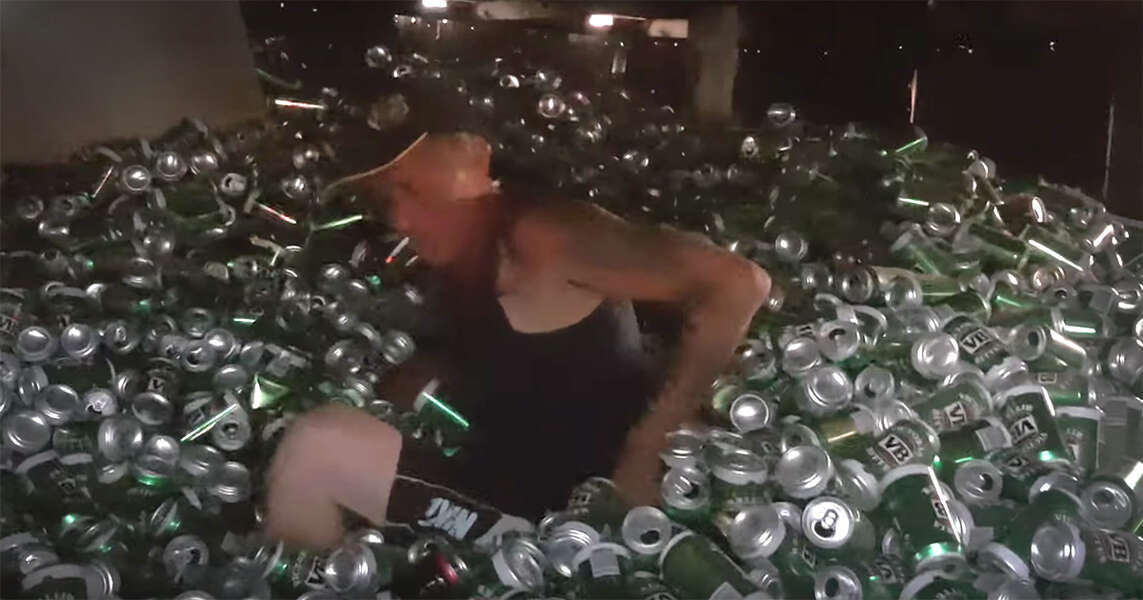 An Australian Man Built a Swimming Pool of Beer Cans - Thrillist
