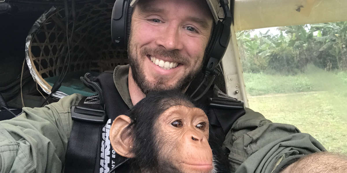 Pilot Does The Sweetest Thing For Rescued Baby Chimp - Videos - The Dodo