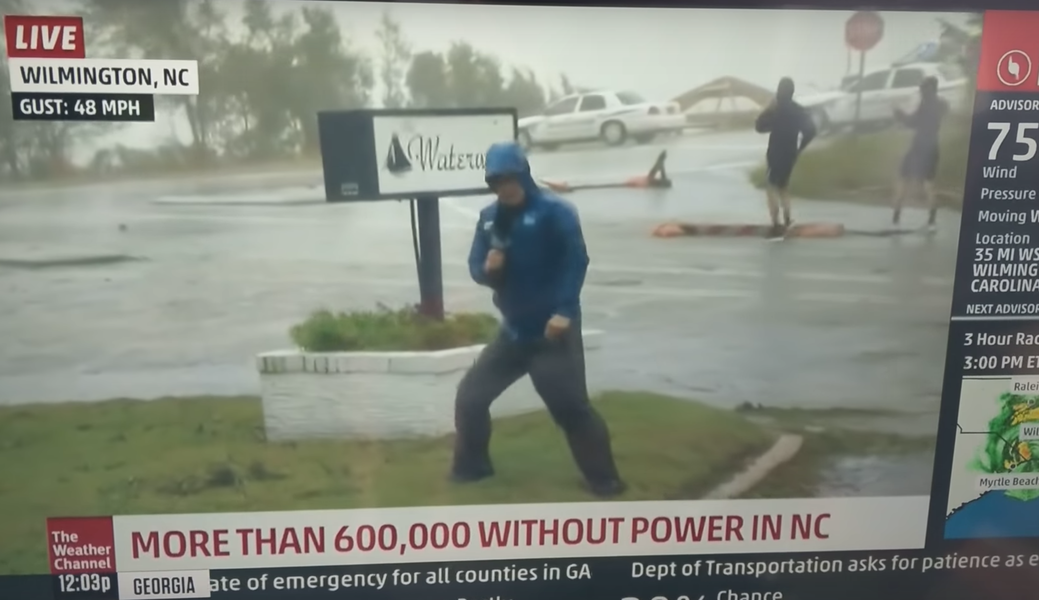 Weatherman Struggles Against Hurricane Florence as Men Stroll By ...