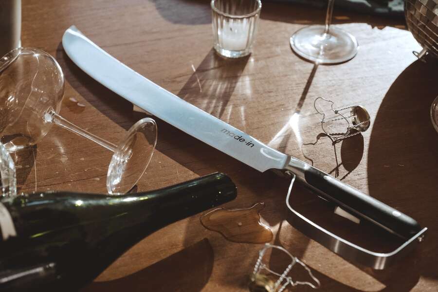 How to Use a Champagne Saber Safely - Thrillist