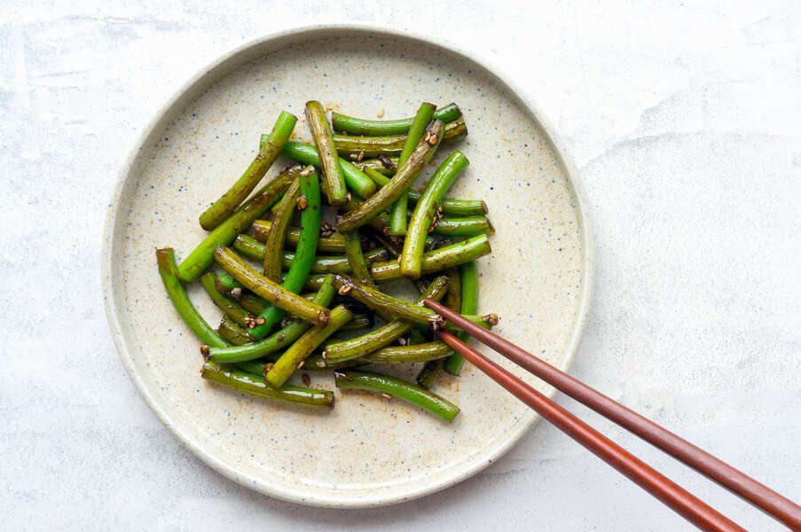 What Are Garlic Scapes and How Can You Cook With Them - Thrillist