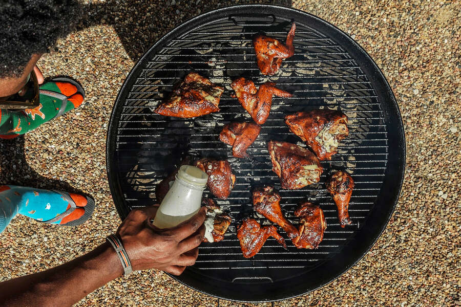 How to Make Alabama White Sauce and Pecan Smoked BBQ Chicken - Thrillist