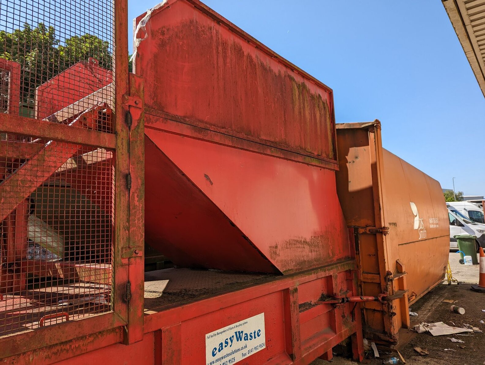 People Hear Cries Coming From Inside Cardboard Compressor - The Dodo