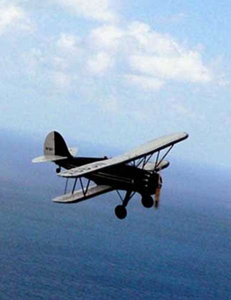 Black and White Biplane - Thrillist