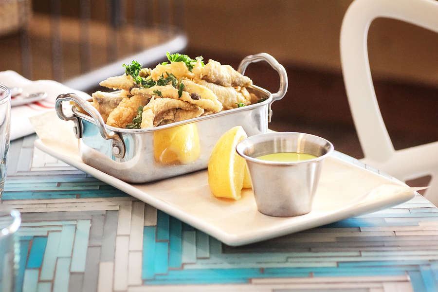 Fish Public - Wash down seafood poutine with cocktails by the bottle ...