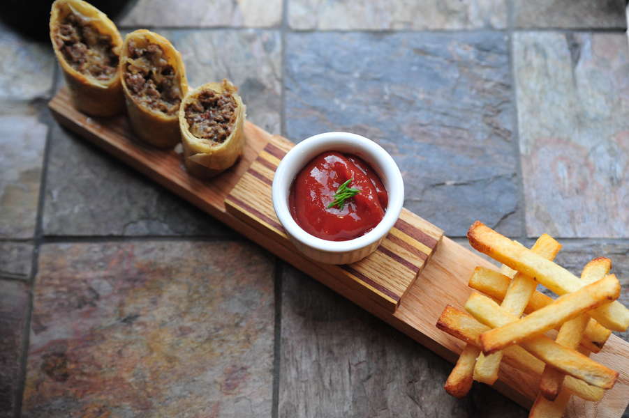 Bocadillo - Cheesesteak spring rolls are just part of Mile High's most ...